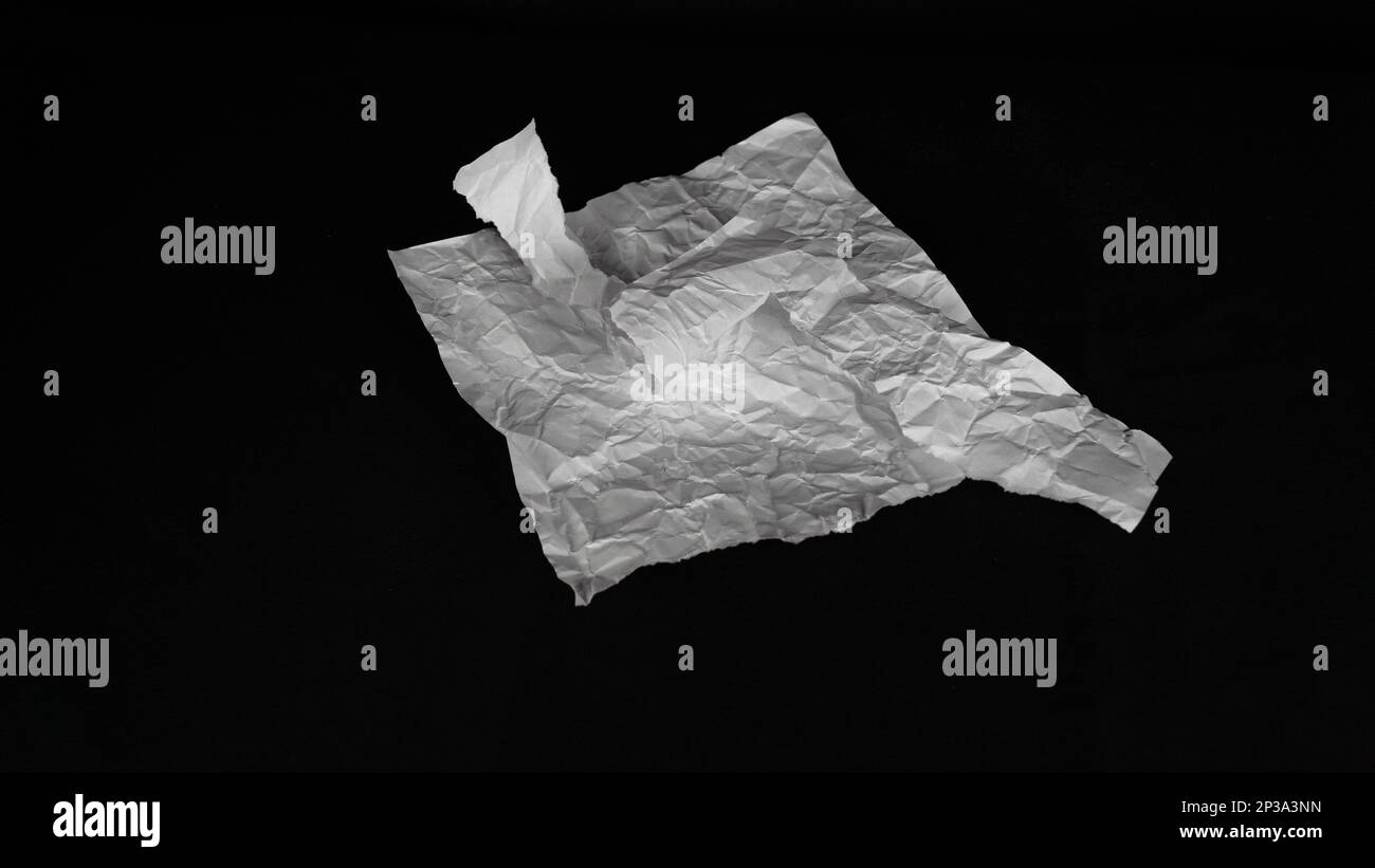 Torn paper. White and torn white a4 paper on black background Stock ...