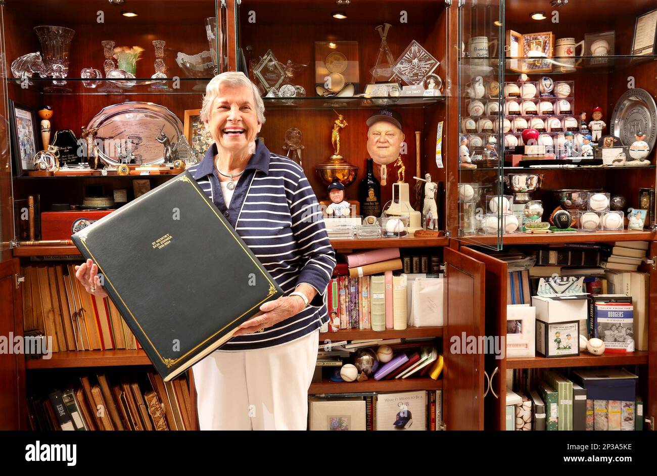 Carol Jean Bauerle, nicknamed "Soot" by her grandmother, holds one of ...