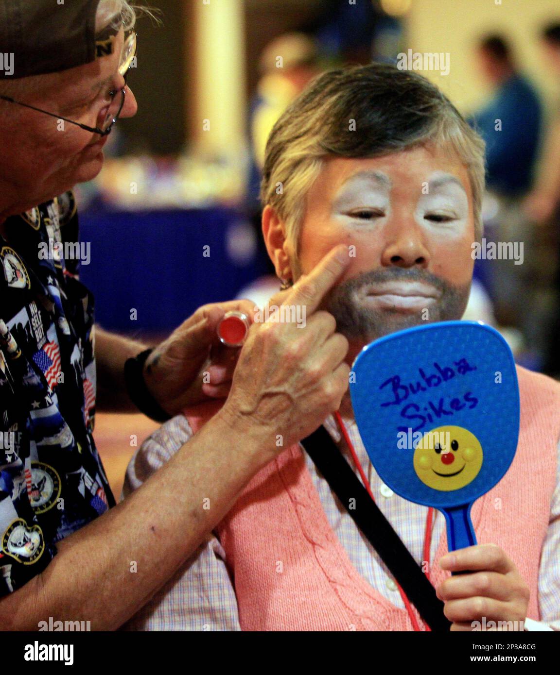 JT "Bubba" Sikes, of Bubble Clown Supplies, of Jacksonville, Fla., puts ...