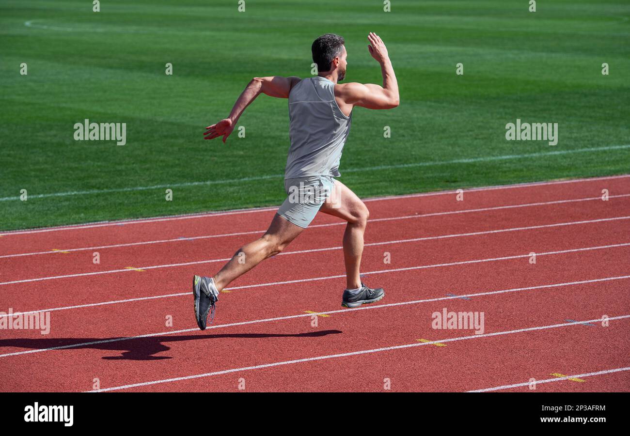 athlete runner do aerobic or anaerobic load. man start running on ...