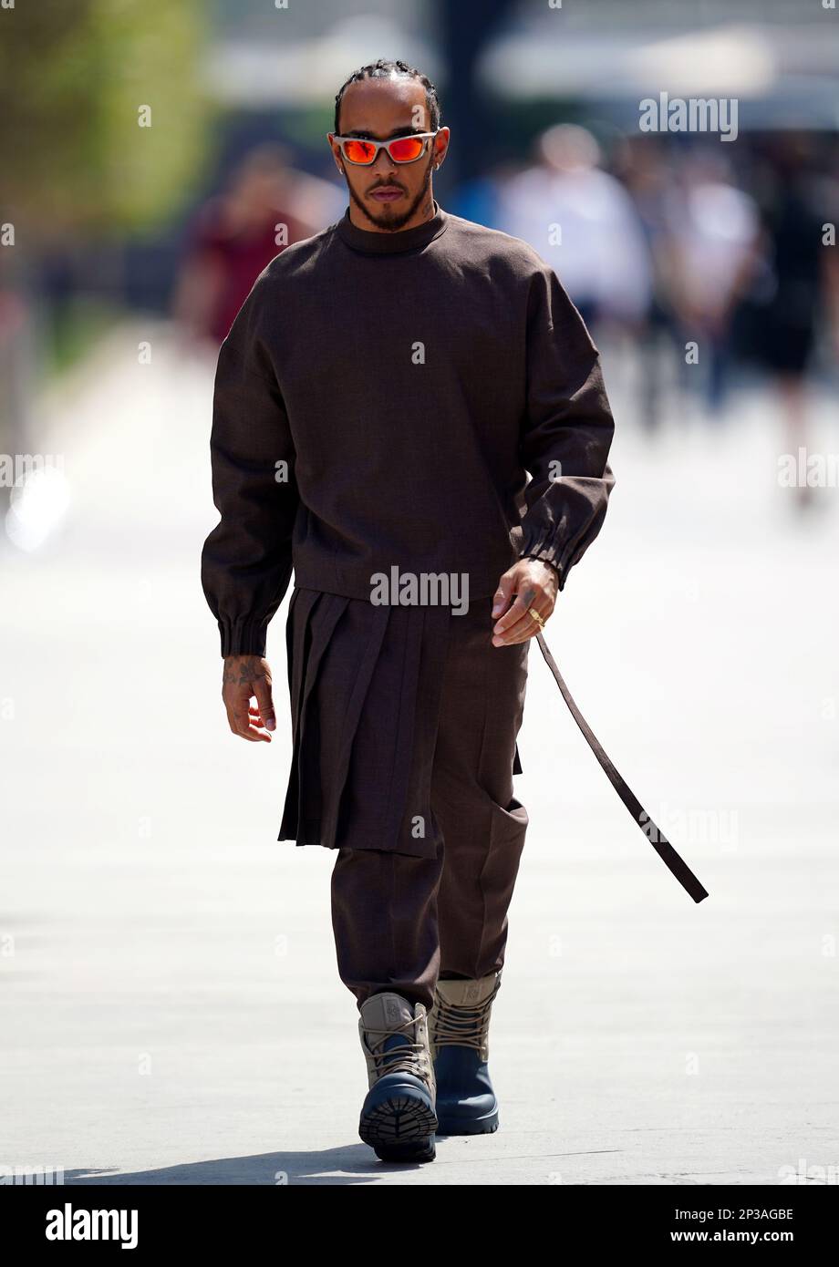 Mercedes' Lewis Hamilton arrives at the track ahead of the Bahrain ...