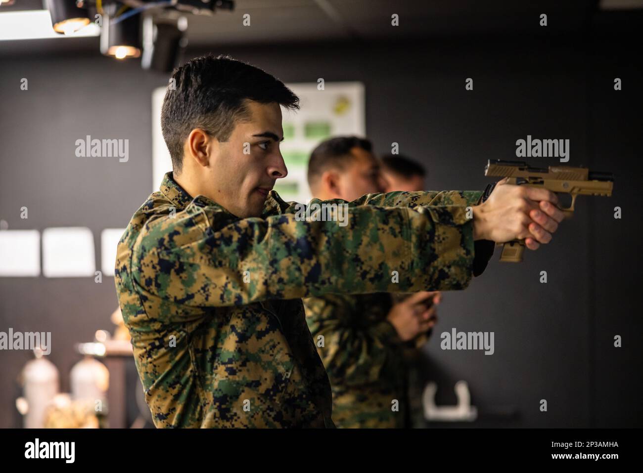 U.S. Marine Corps Cpl. Aaron Pena, range military police with Security ...
