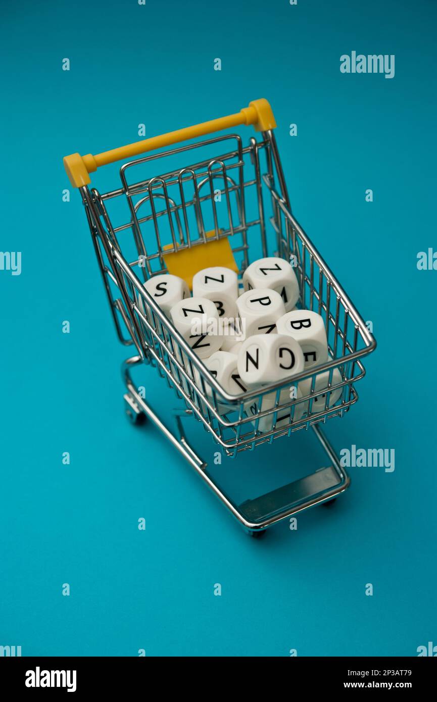 model shopping cart filled with letters Stock Photo - Alamy