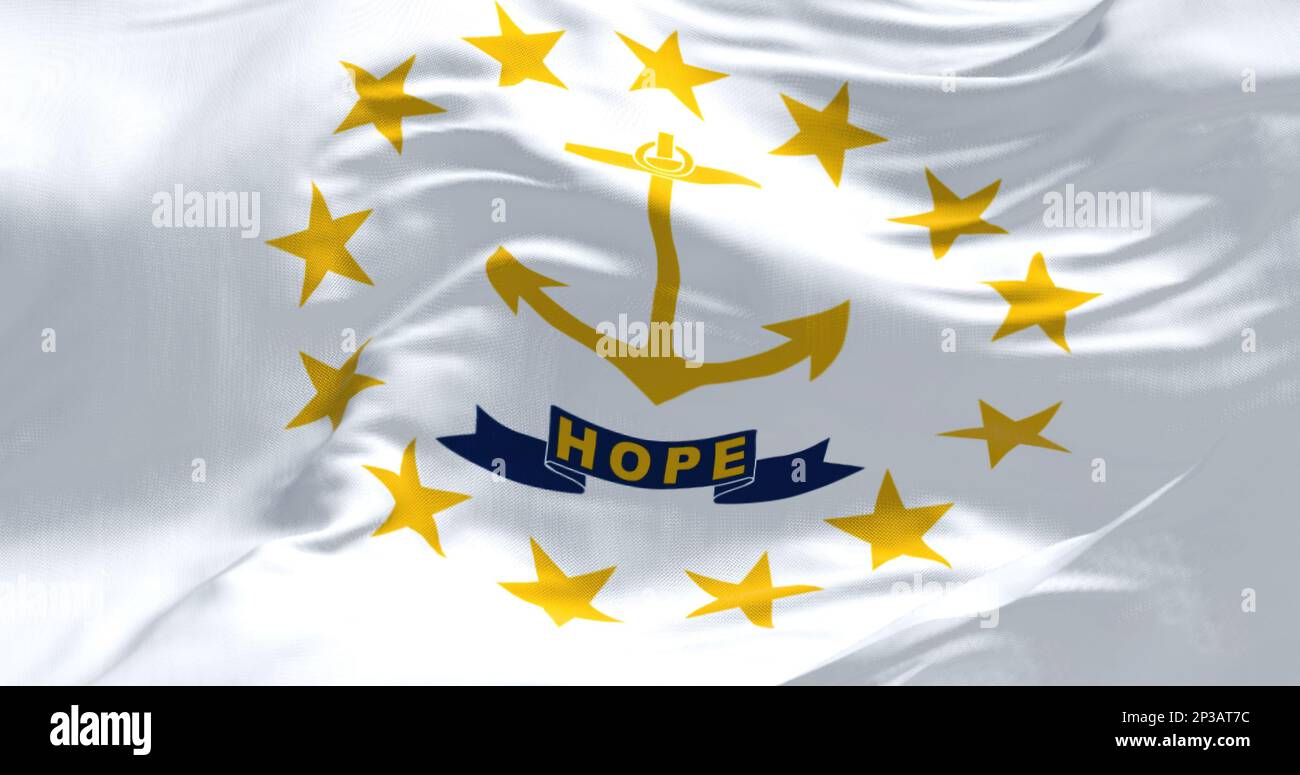 Close-up of the Rhode Island state flag waving. Gold anchor in the ...