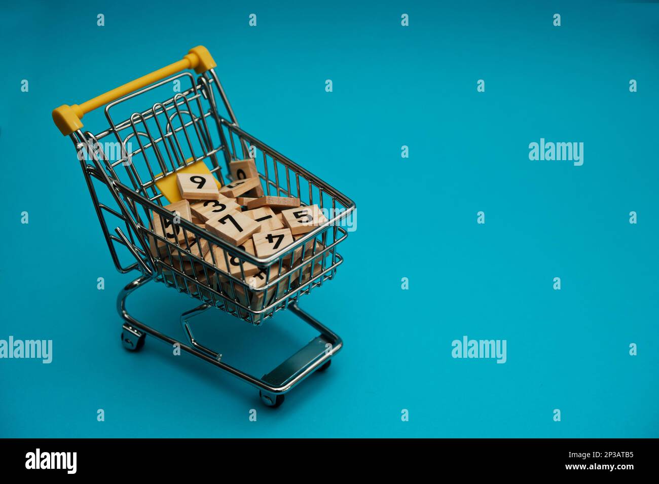 model shopping cart filled with numbers Stock Photo - Alamy