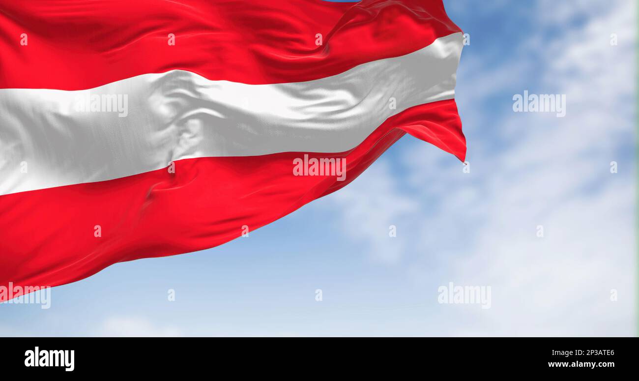 The national flag of Austria waving on a clear day. Three equal ...