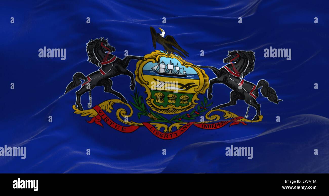 Close-up of the Pennsylvania state flag waving in the wind. Blue flag ...