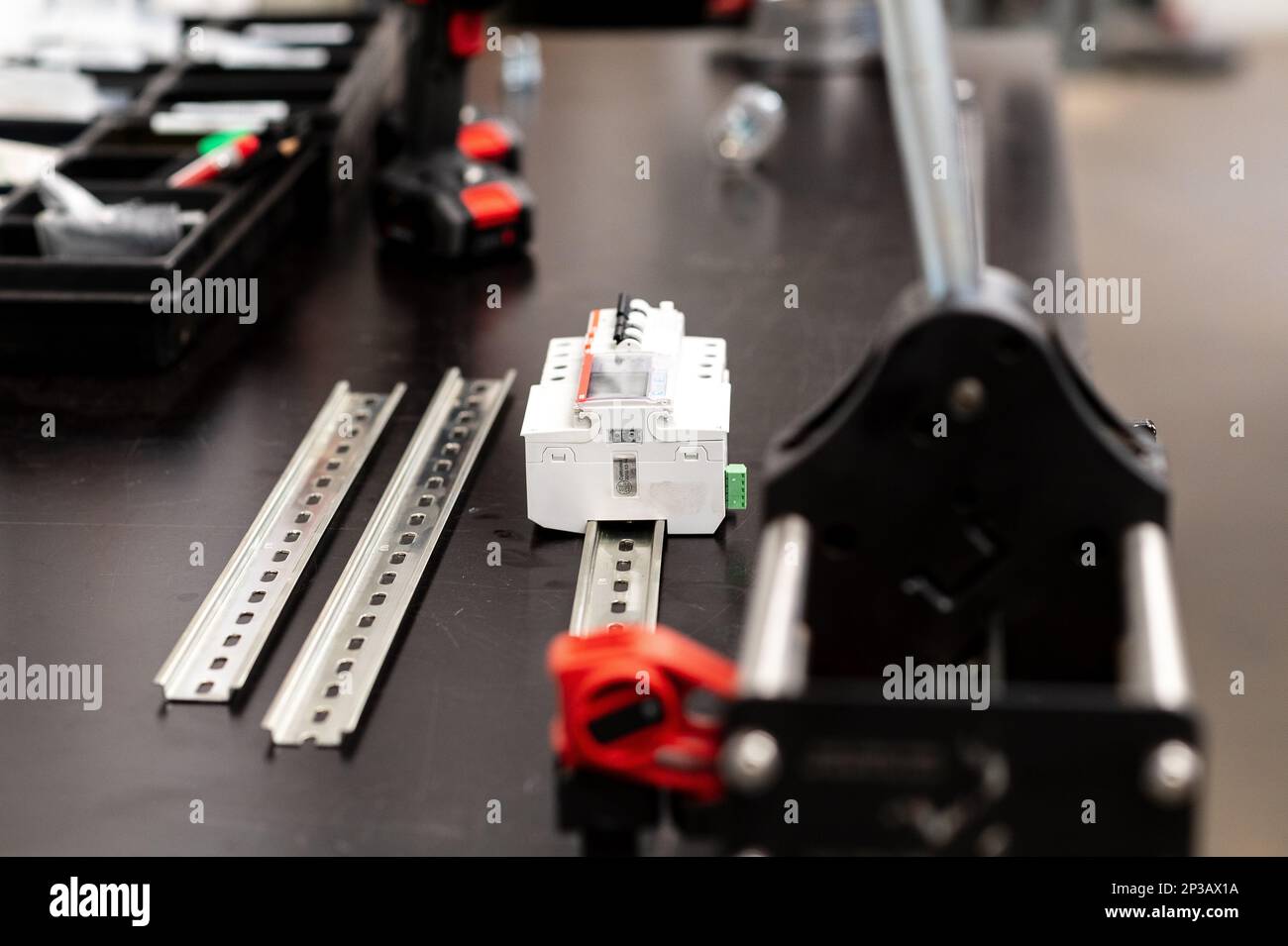 Electrician at work, electric components, electrical voltage ...