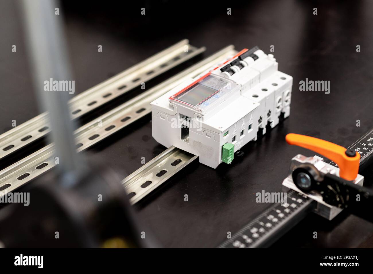Electrician at work, electric components, electrical voltage ...