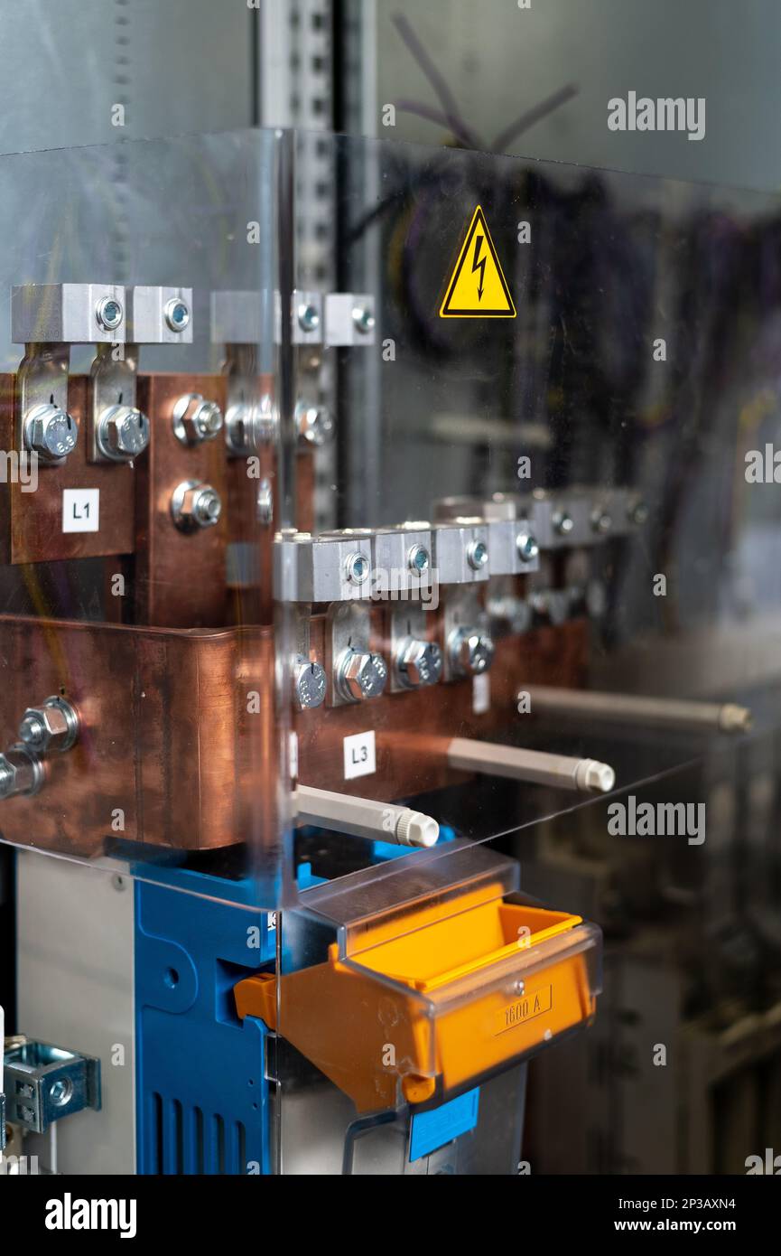 Electrician at work, electric components, electrical voltage ...
