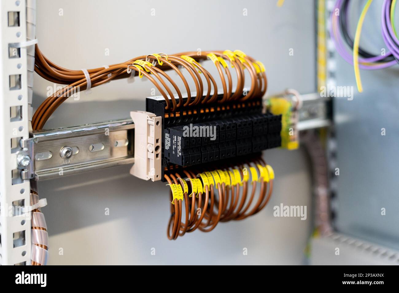 Electrician at work, electric components, electrical voltage ...