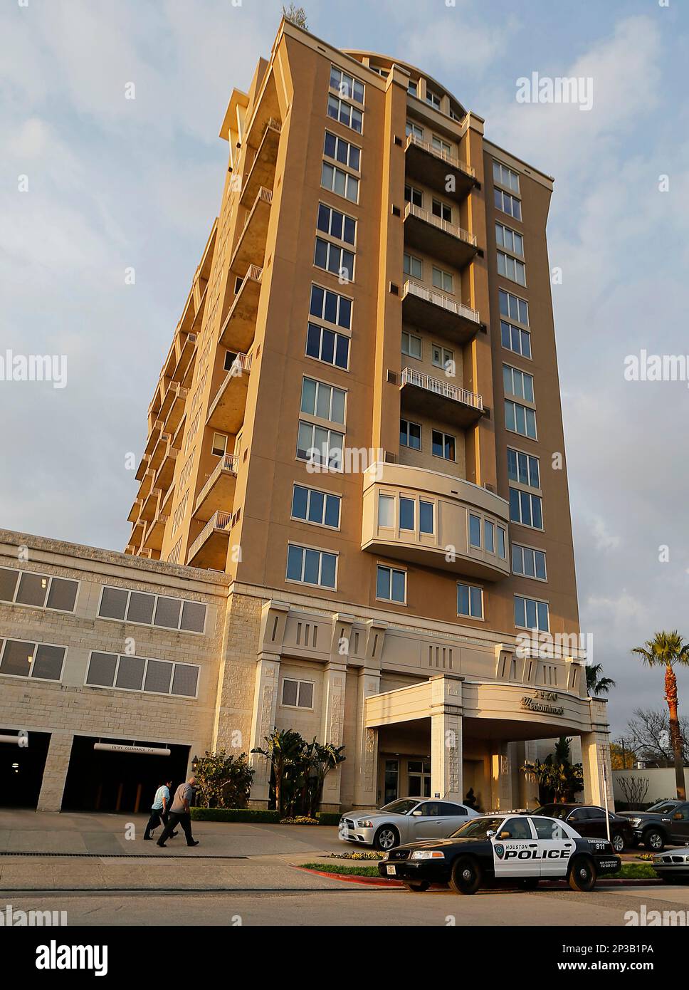 Law enforcement officers walk toward the building where Robert Durst ...