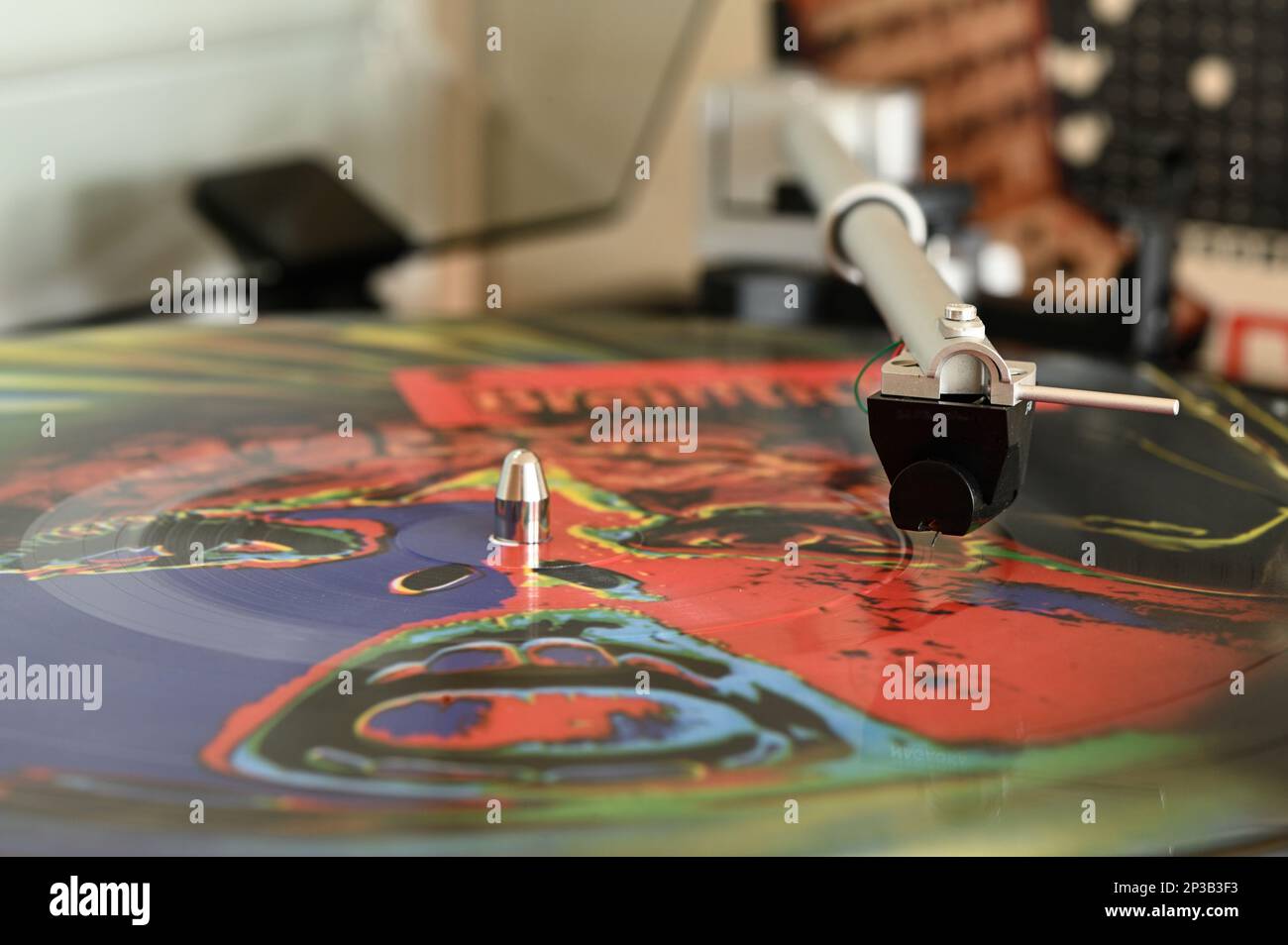 Colored vinyl on the record player Stock Photo - Alamy