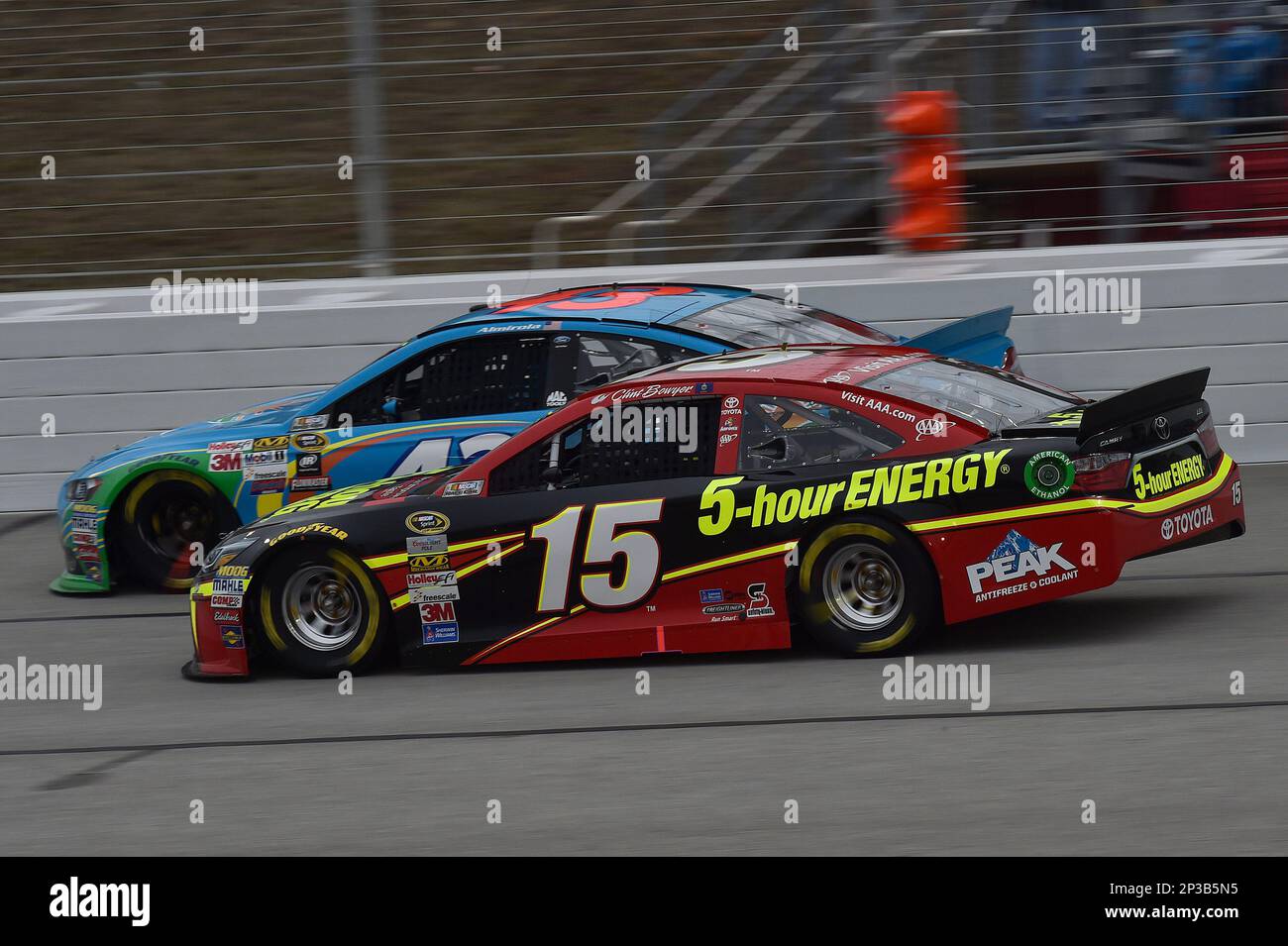 Aric Almirola (43) races with Clint Bowyer, 5-Hour Energy Toyota Camry ...