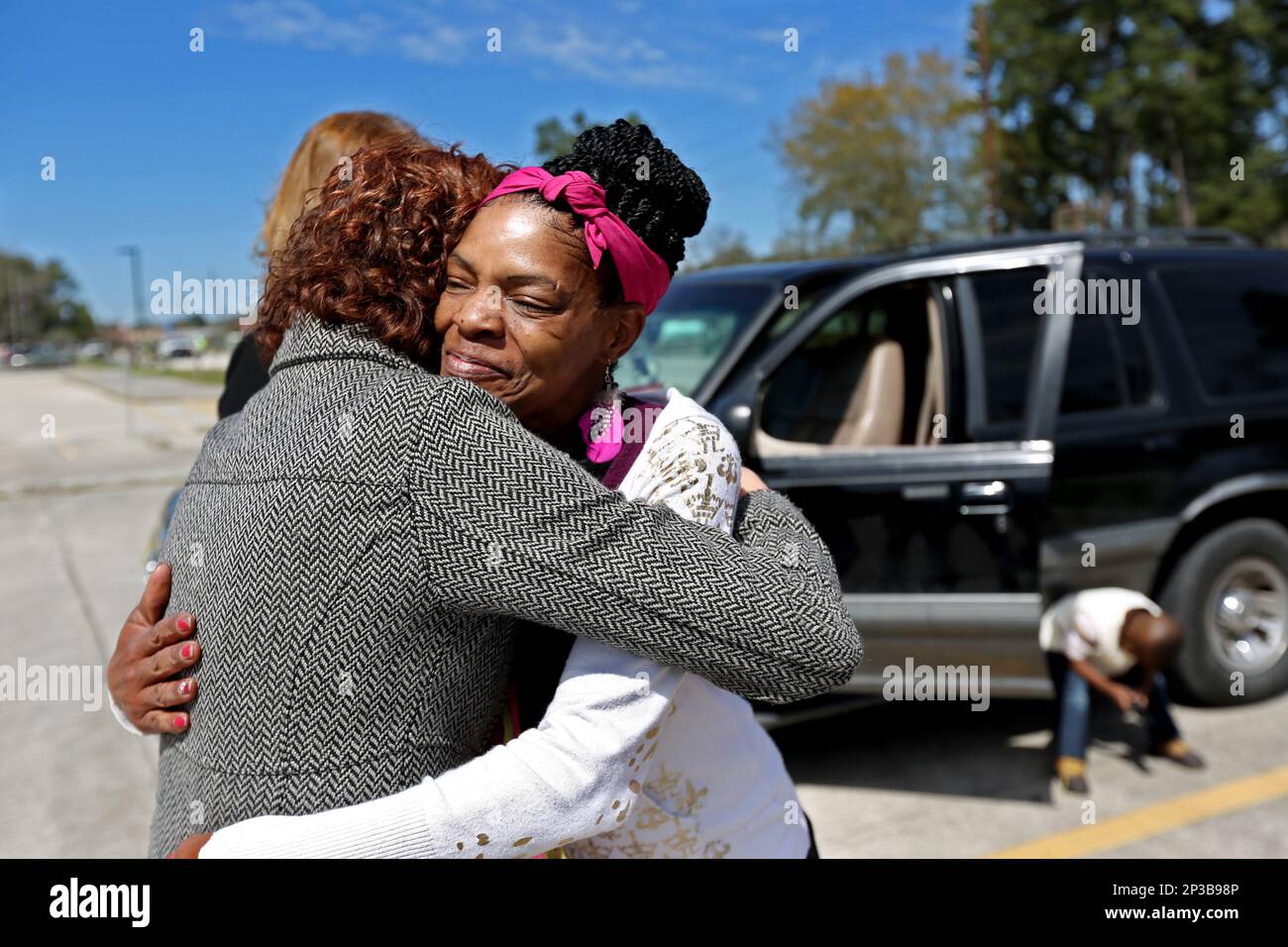 Michelle Davis, right, shown with grandson Nigel Davis, three, far ...