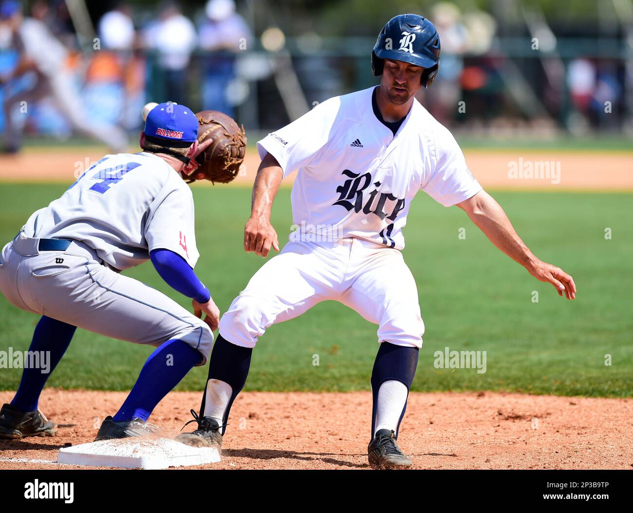 March 14, 2015: Rice's Ford Stainback (11) beats the throw back to first during the Louisiana ...
