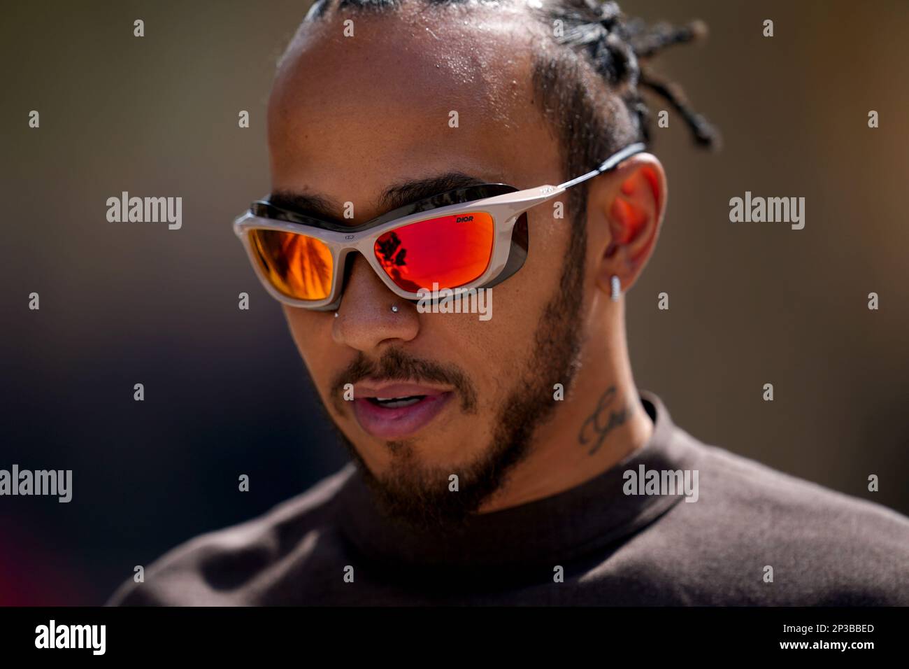 Mercedes' Lewis Hamilton arriving before the Bahrain Grand Prix at the ...