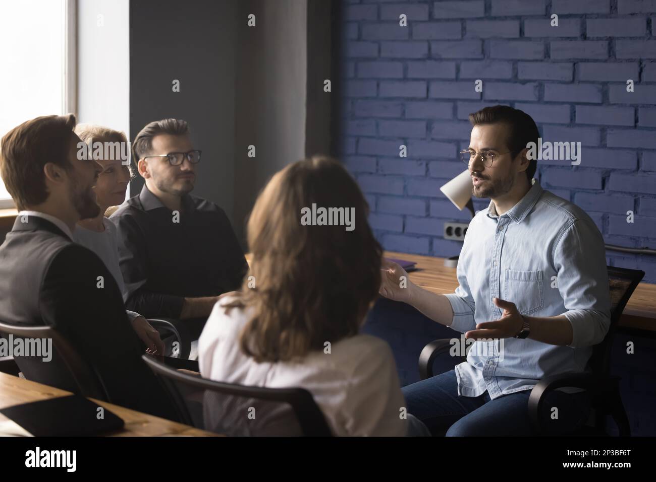 Business group brainstorming on meeting in office Stock Photo - Alamy