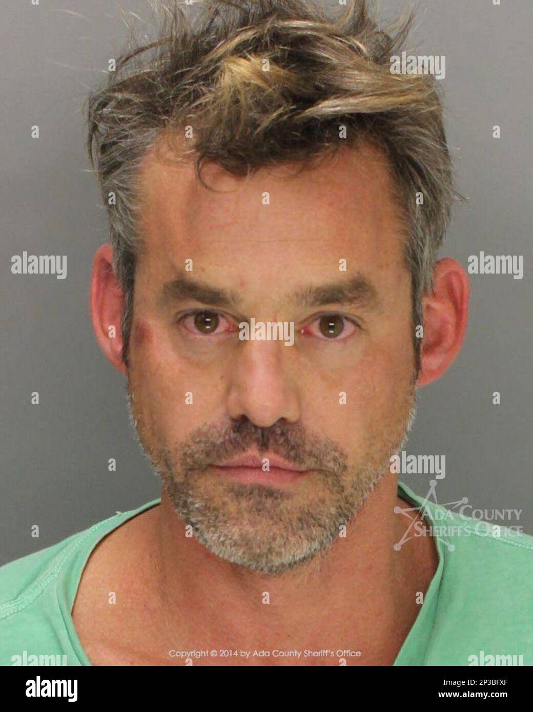 FILE - This Friday, Oct. 17, 2014 file photo shows the booking photo ...