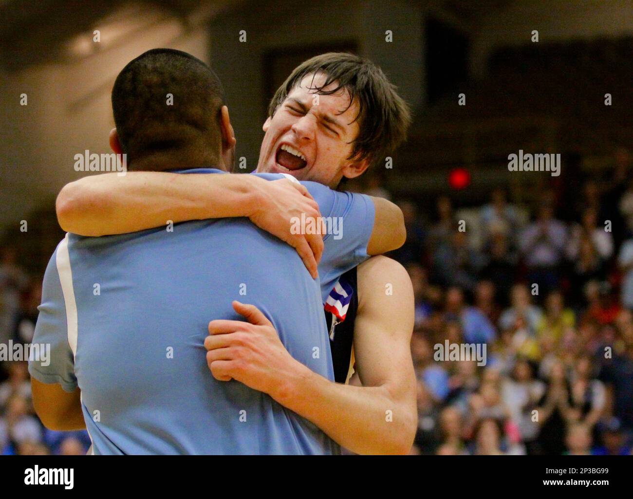 Scott City's Sloan Baker (23) yells as he receives his state ...