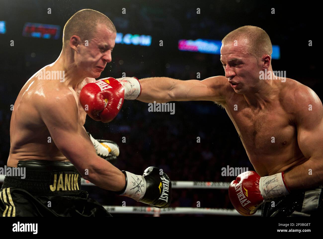David Theroux, right, punches Janik Lukasz during their boxing bout ...