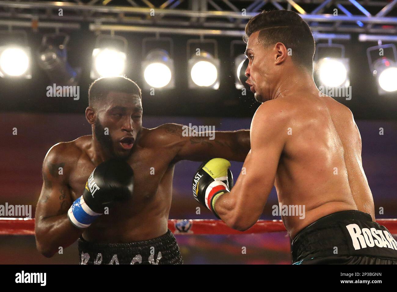 Alphonso Black (L) and Daniel Rosario square off during a Telemundo Boxeo boxing match at the A ...