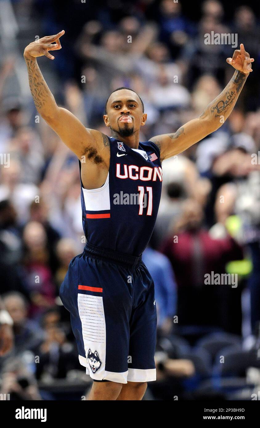 Connecticut’s Ryan Boatright celebrates after hitting a 3-point shot to ...