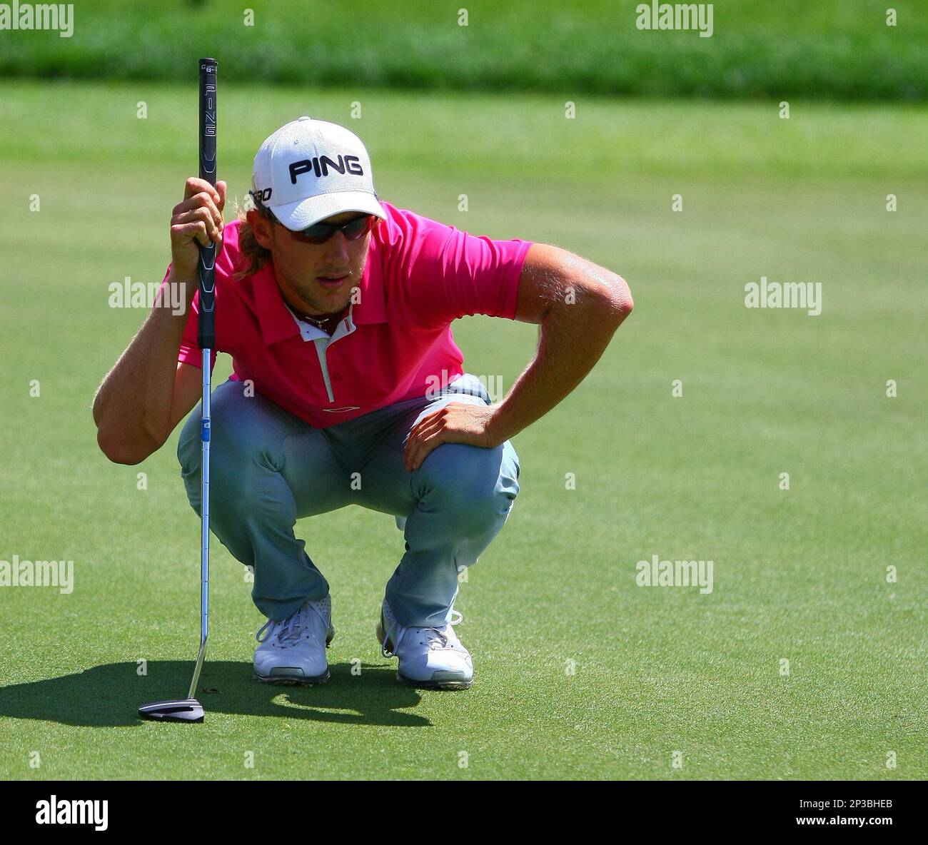 March 14 2015: Derek Ernst sizes up an eagle put on the first hole in ...