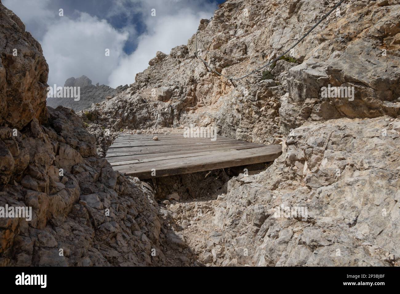 Elements set by man to facilitate the route via ferrata. Dolomites ...