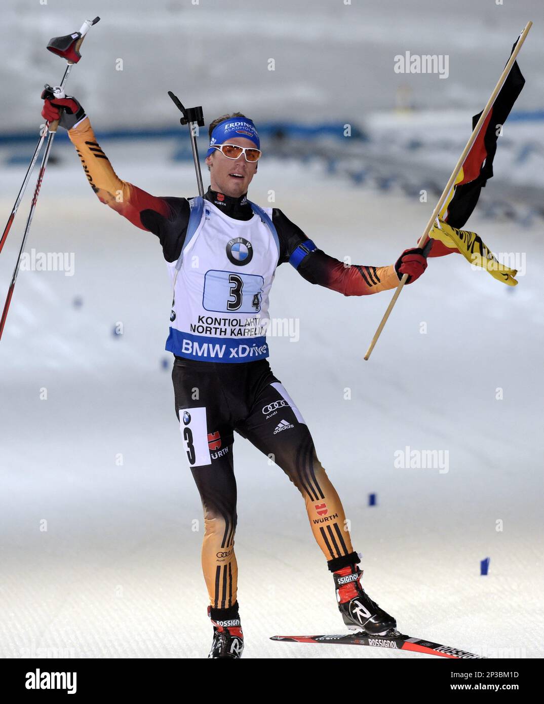 Germany's anchor Simon Schempp celebrates at finish after winning gold ...