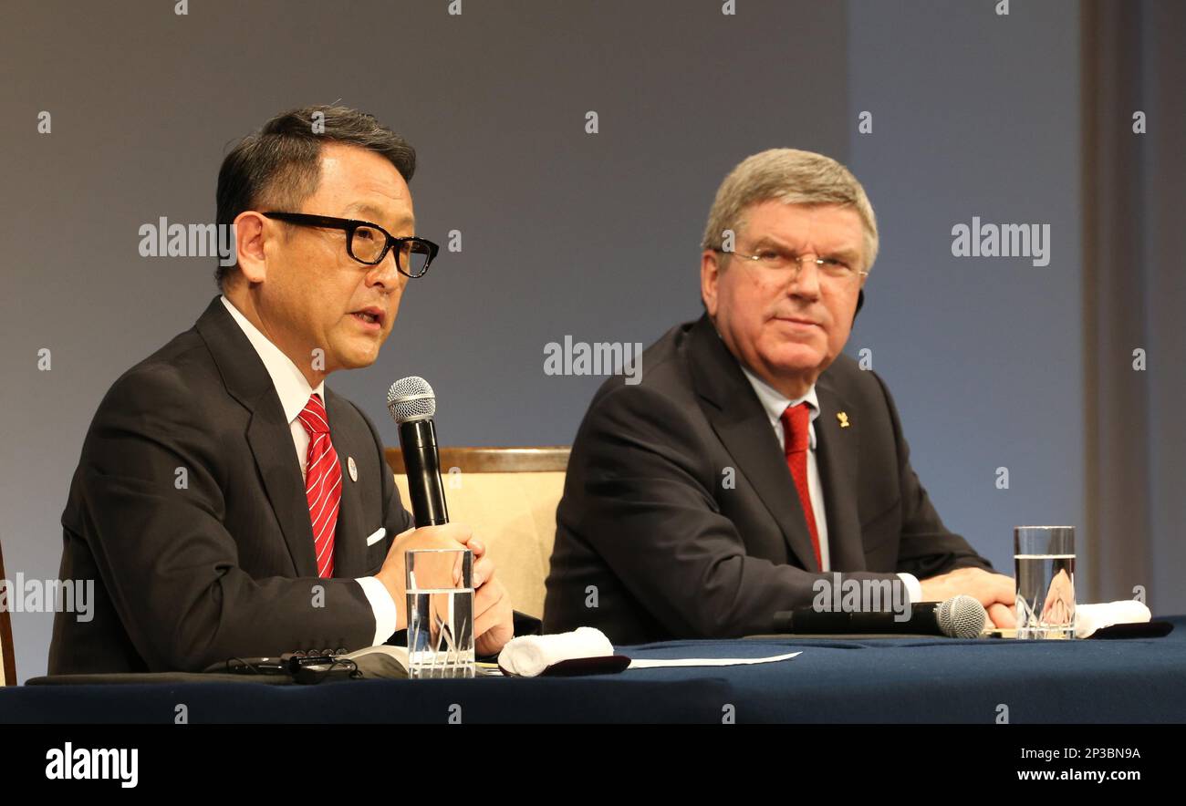 Akio Toyoda (L), President of Toyota Motor Corp. and Thomas Bach ...