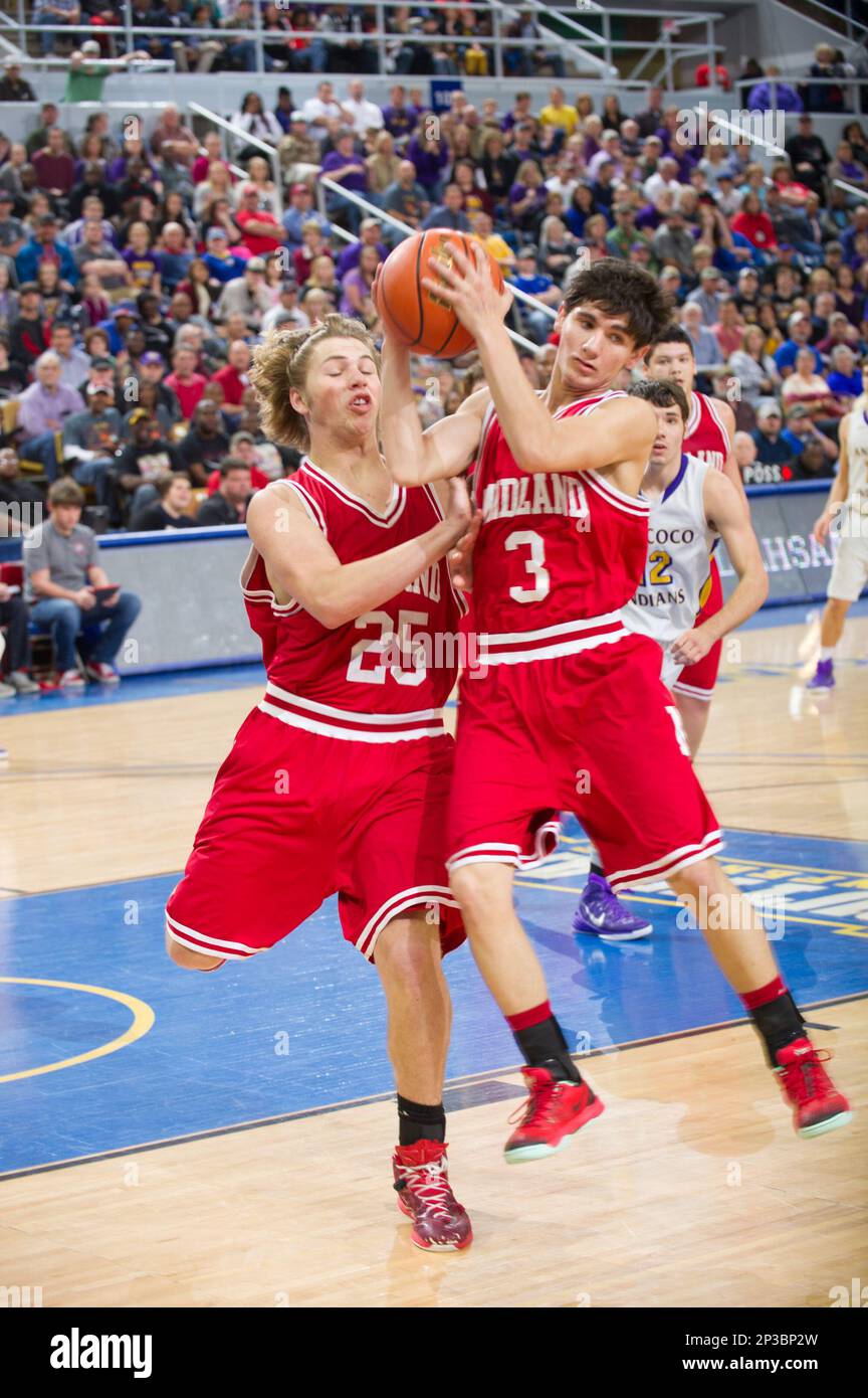 Midland's Dagan Patin and Dylan Boudreaux both go after a loose ball ...