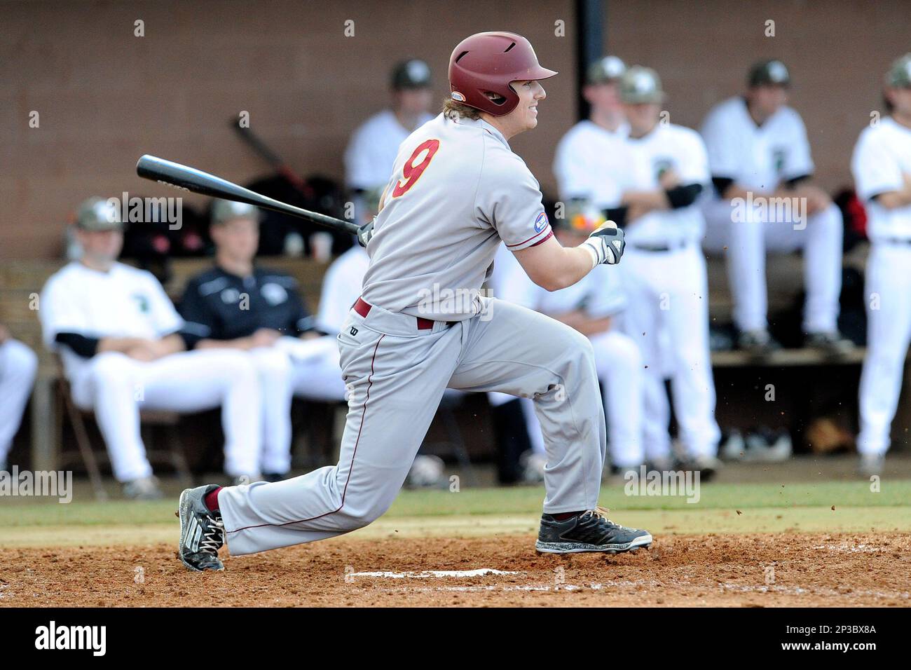 Center fielder John Menken (9) of the Winthrop University Eagles bats ...
