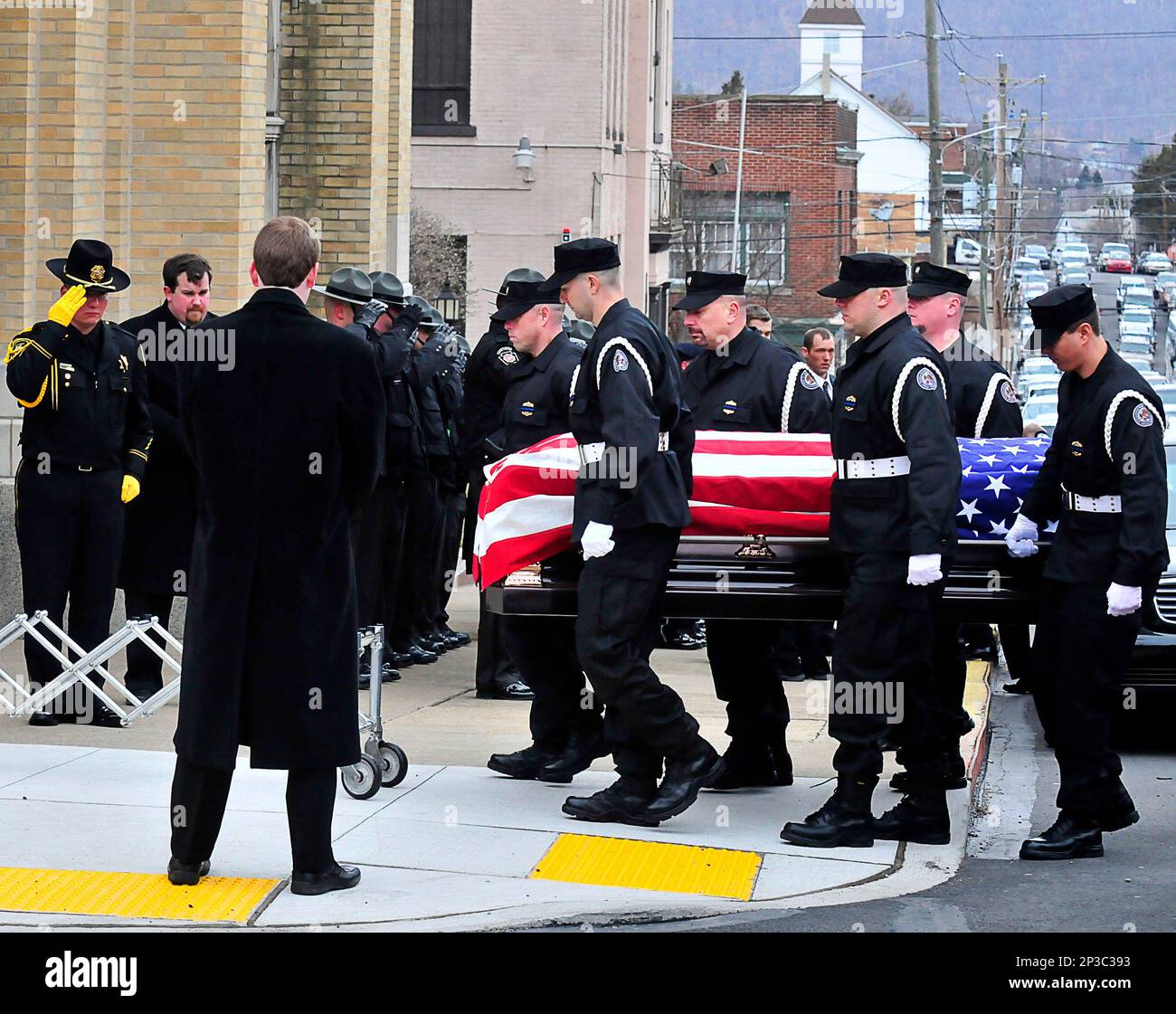FILE - In this March 2, 2013, file photo, corrections officers carry ...