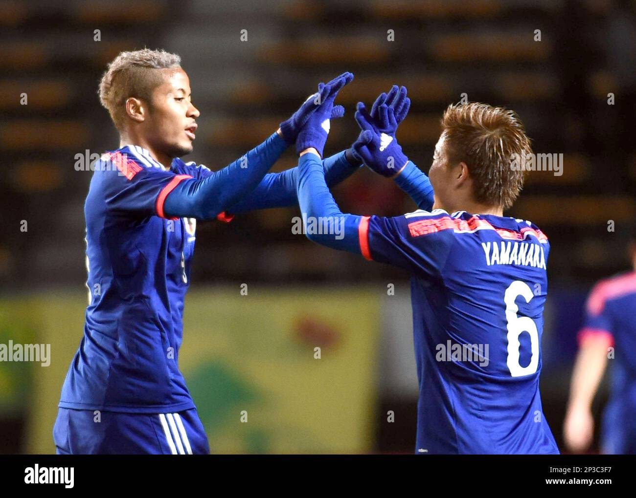 Japan's Musashi Suzuki (L) celebrates with his teammate after scoring ...