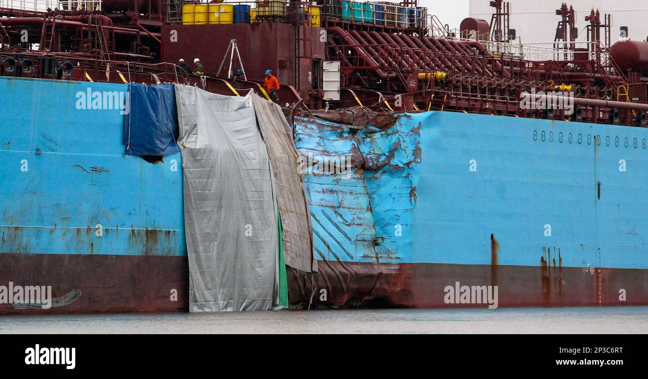 This photo shows the damaged hull of the Carla Maersk, a chemical ...