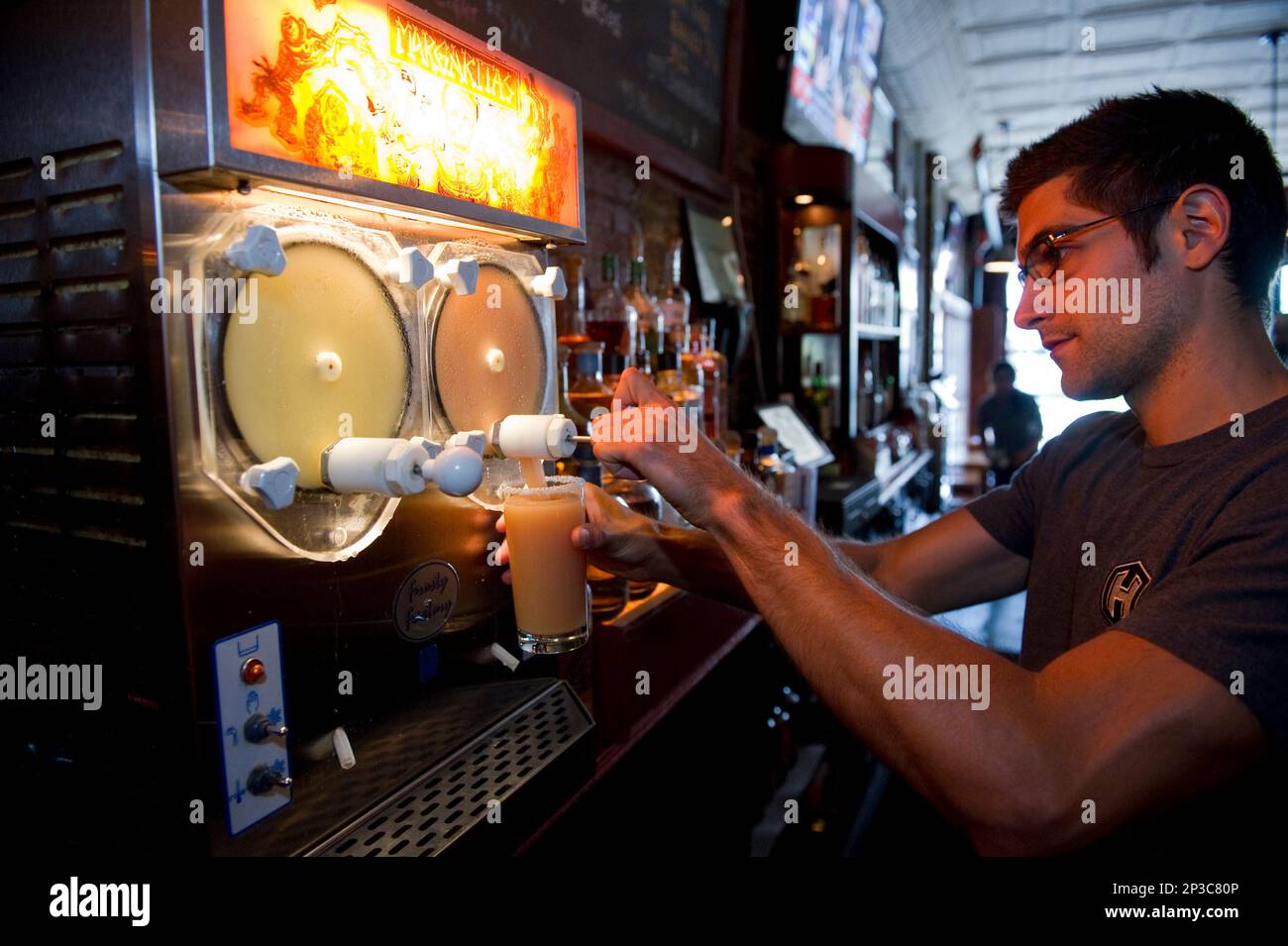 UNITED STATES - JUNE 19: H St. Country Club bartender Tony Deleo makes ...