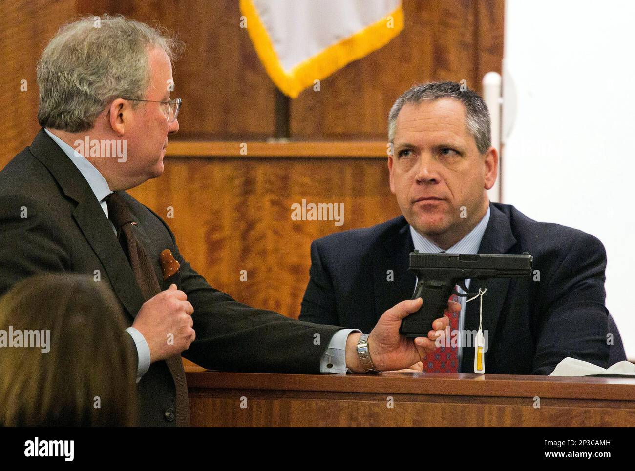 Prosecutor Patrick Bomberg, left, questions Kyle Aspinwall, an employee ...
