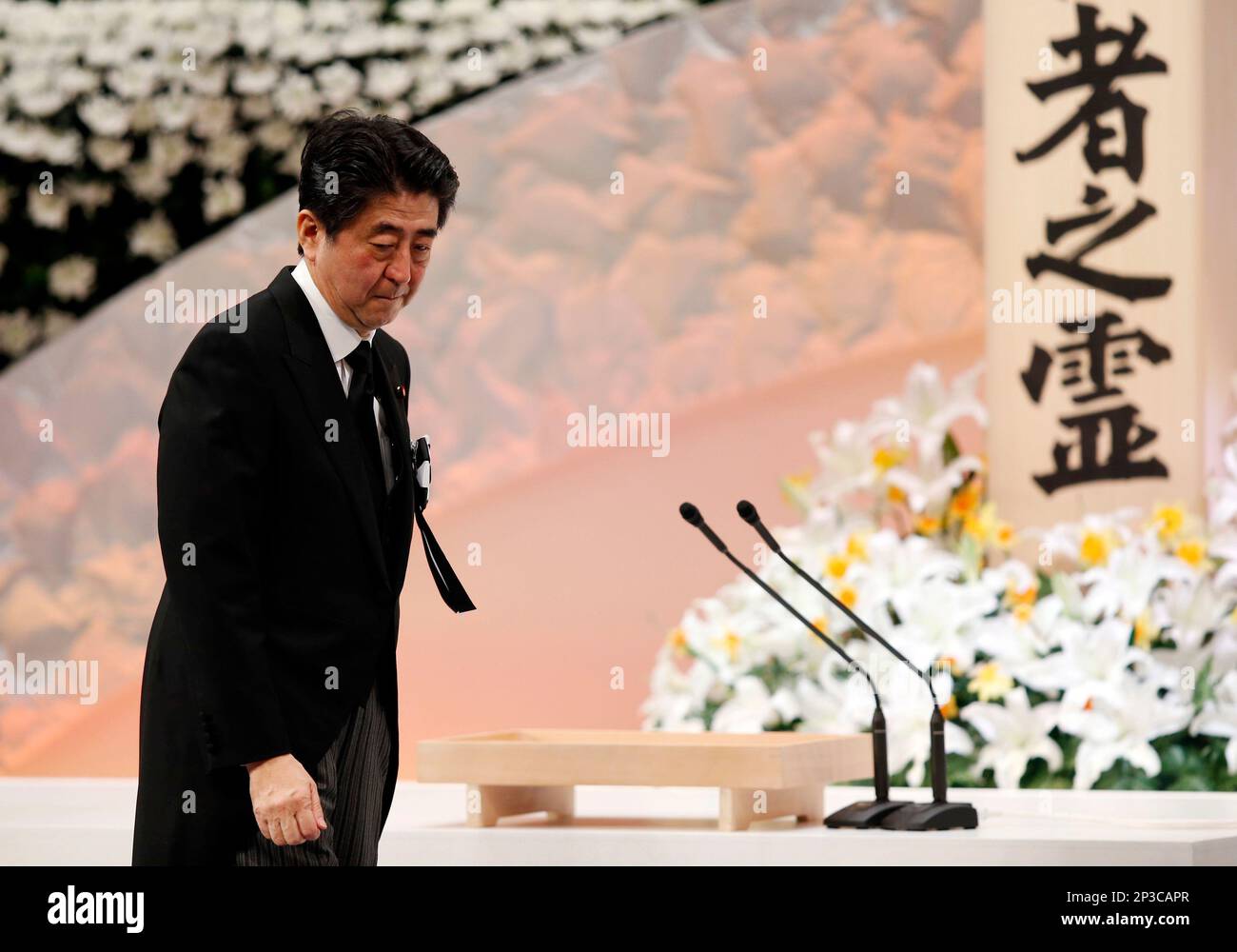 Japan's Prime Minister Shinzo Abe attends the national memorial service ...