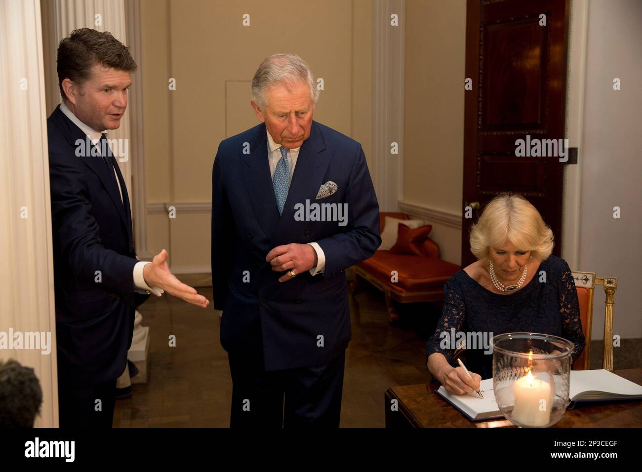 Britain's Prince Charles is shown an artwork, not pictured, by U.S ...