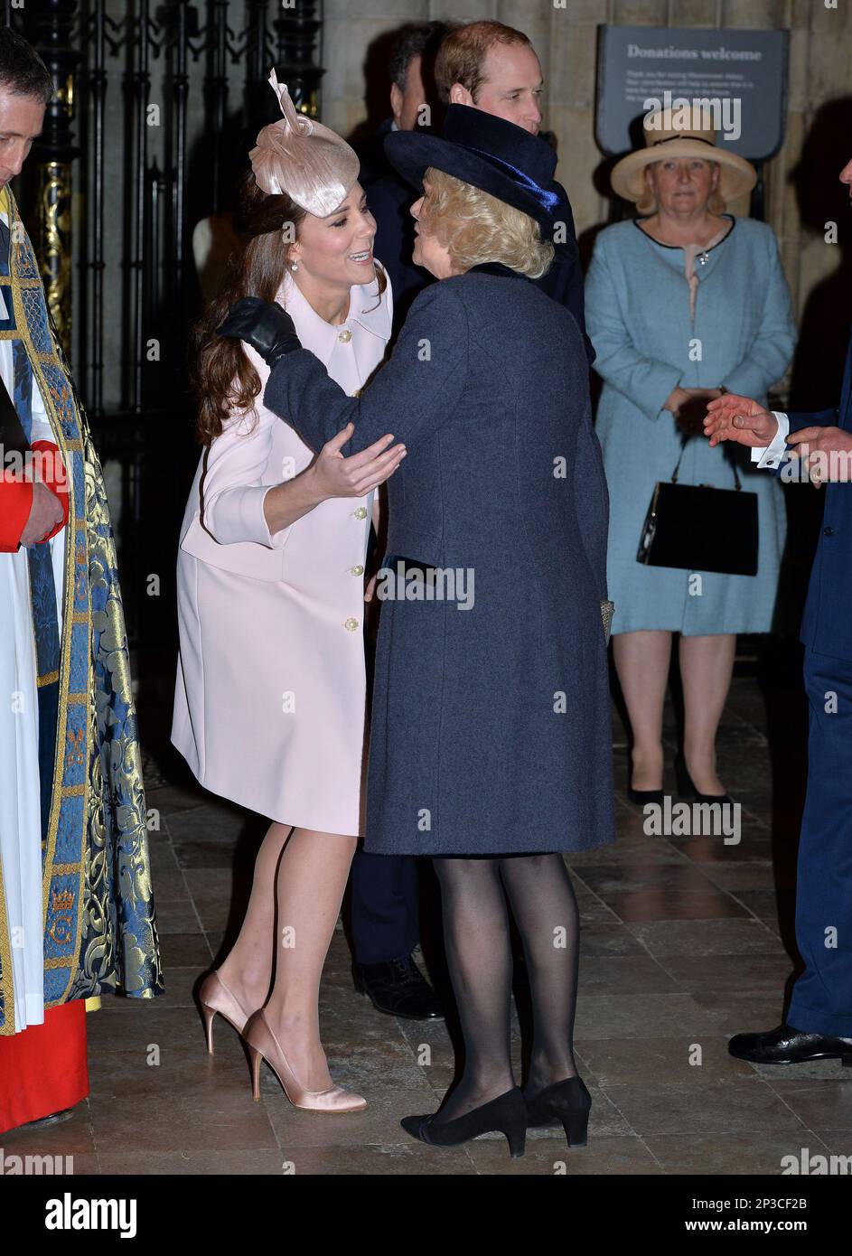 Britain's Kate, the Duchess of Cambridge, left, hugs Camilla, the ...