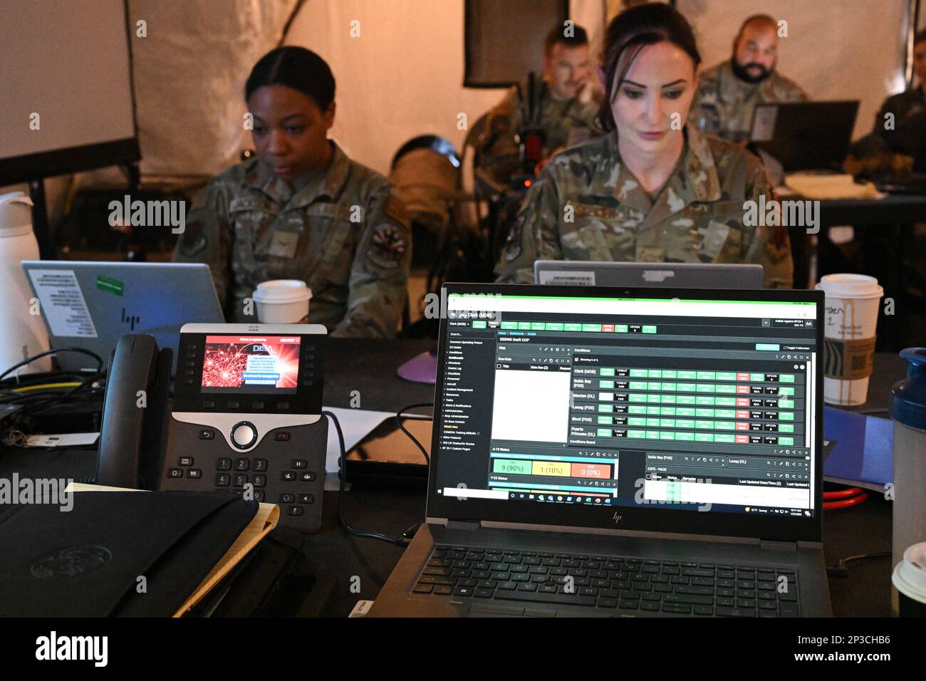 U.S. Air Force Master Sgt. Kirsten Sigerson, right, 355th Command Post ...