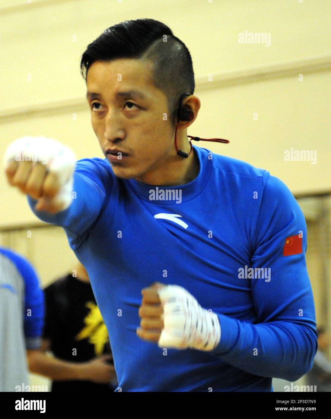 Olympic boxing gold medalist Zou Shiming of China takes part in a ...