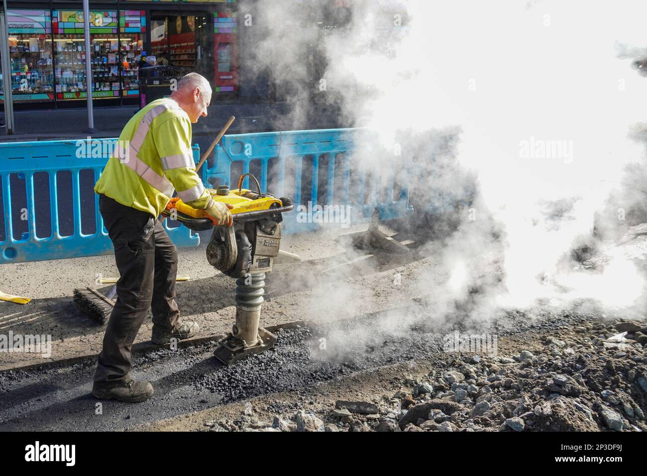 Male employee working repairing hi-res stock photography and images - Alamy