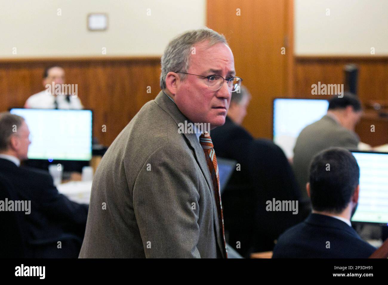Prosecutor Patrick Bomberg looks at a monitor during the murder trial ...