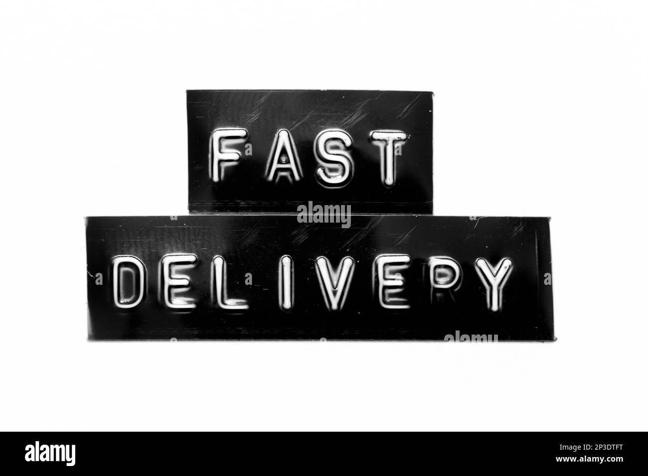 Black color banner that have embossed letter with word fast delivery on ...