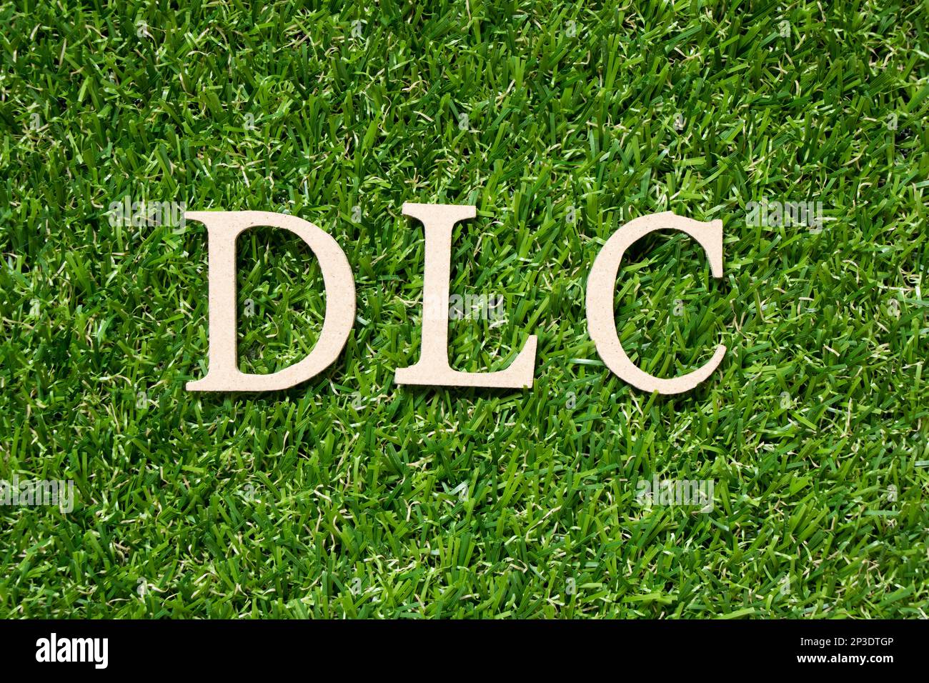 Wood alphabet letter in word DLC (abbreviation of downloadable content ...