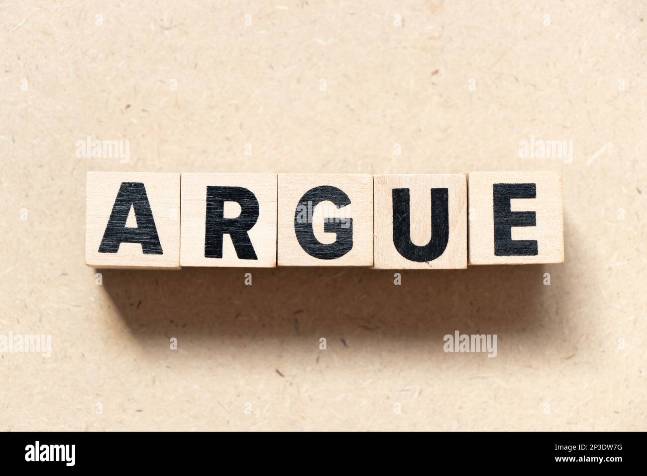 Alphabet letter block in word argue on wood background Stock Photo - Alamy