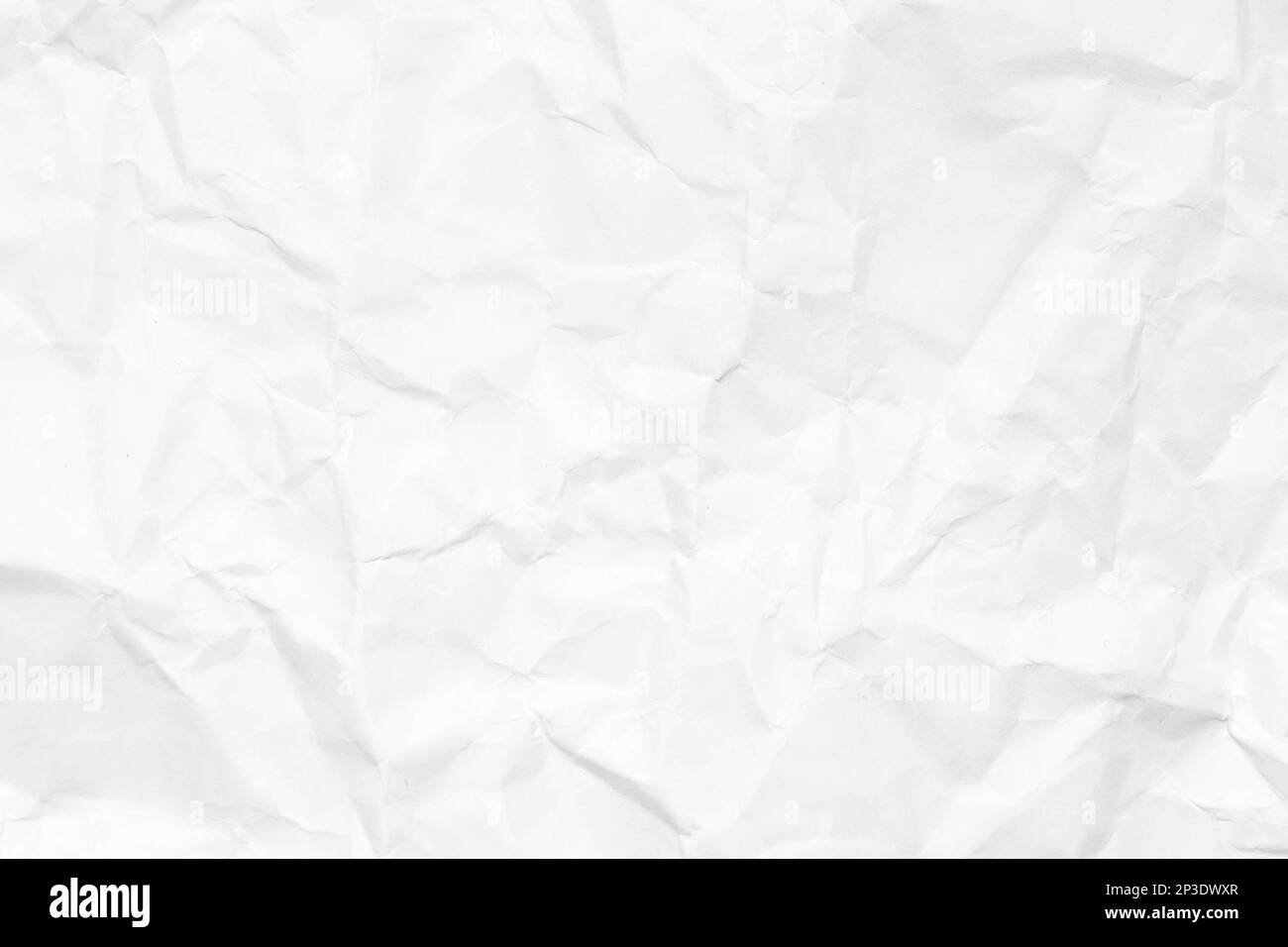 Grunge wrinkled white color paper textured background with copy space ...