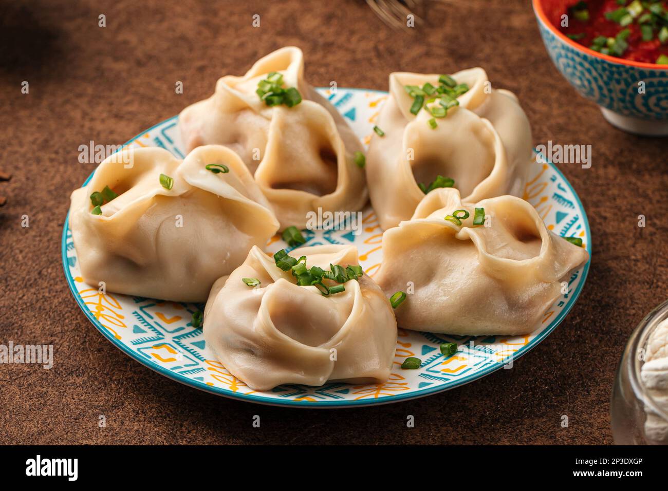 Portion of steamed tatar manti dumplings Stock Photo - Alamy